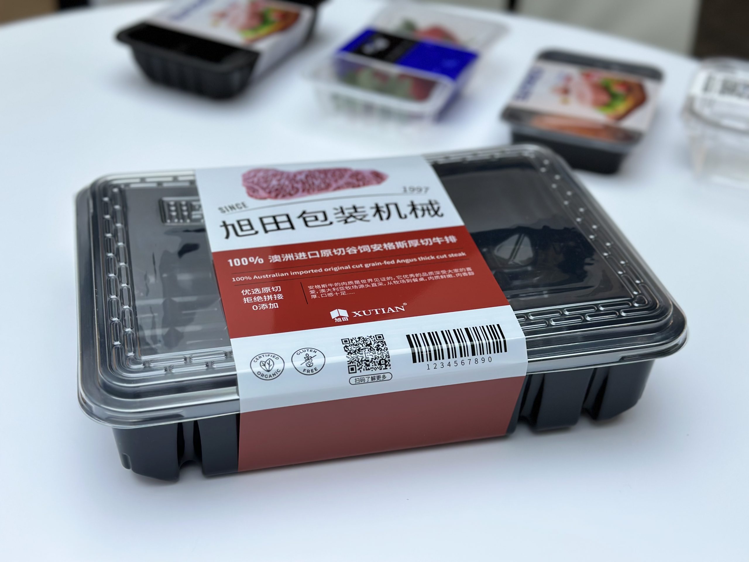 Sunpack Paper banding machineFresh food tray 150mm wide OPP film banding 1